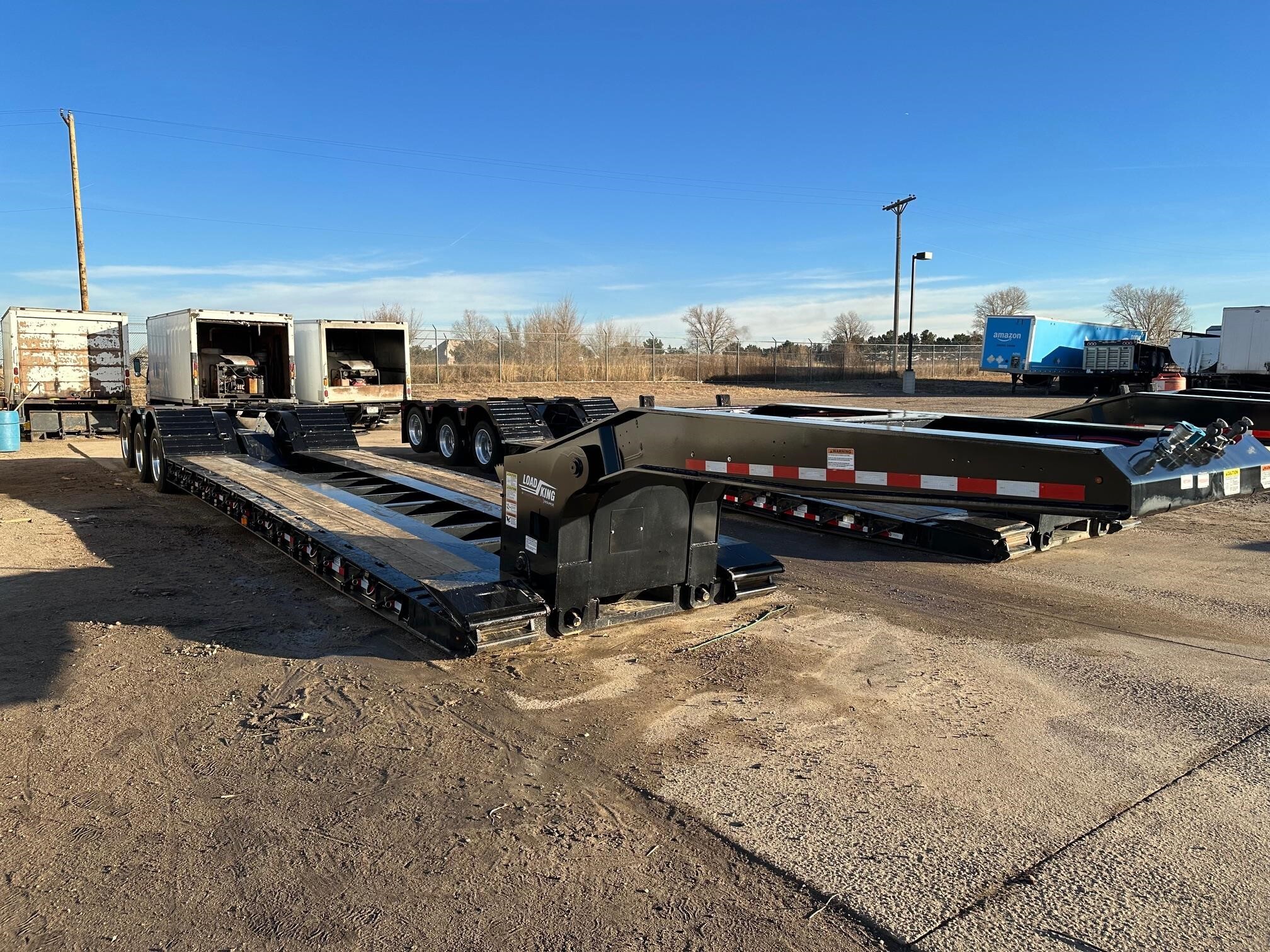 Used 2024 LOAD KING 55 TON LOWBOY W PONY MOTOR, REAR LIFT AXLE, 26' W ...